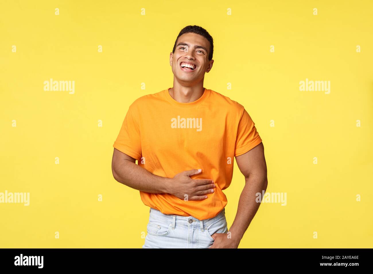 Man feeling pain abdominal muscles as laughing out loud from hilarious ...