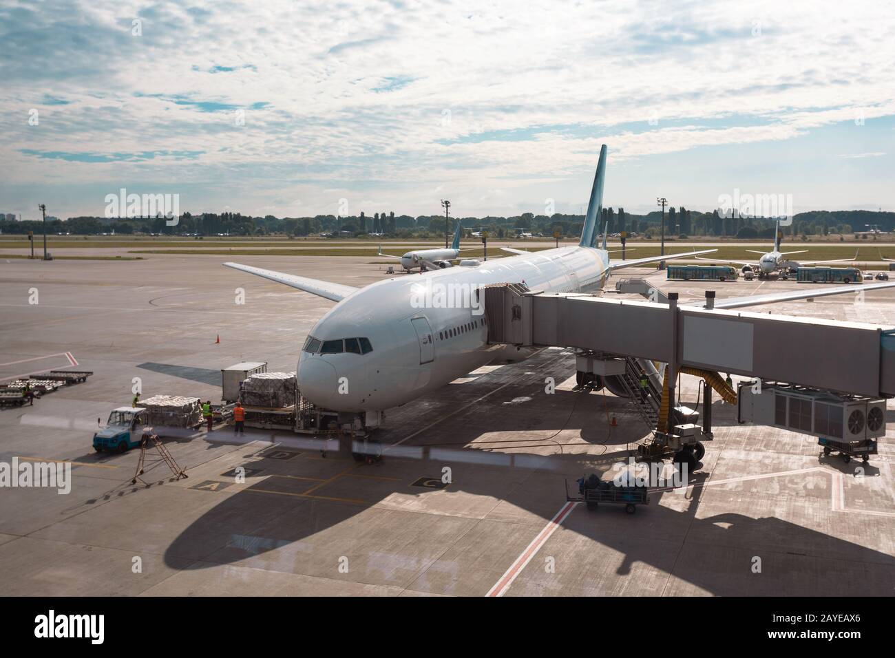 Airplane, view from airport terminal Stock Photo - Alamy