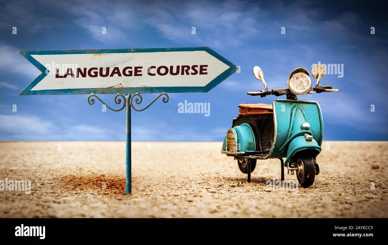 Street Sign to LANGUAGE COURSE Stock Photo - Alamy