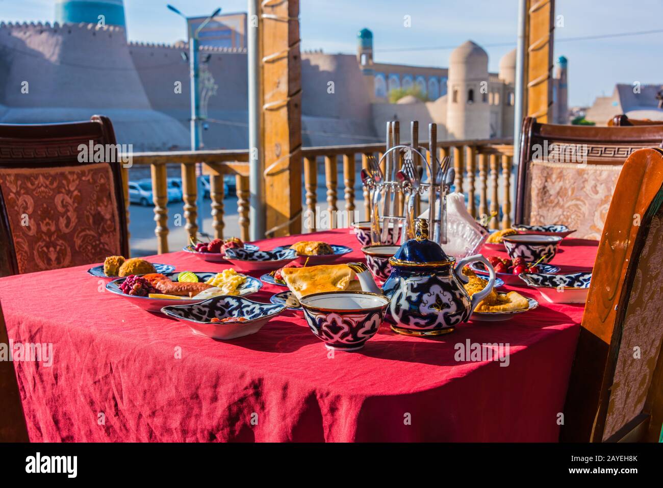 Traditional Uzbek breakfast served on the terrace Stock Photo - Alamy