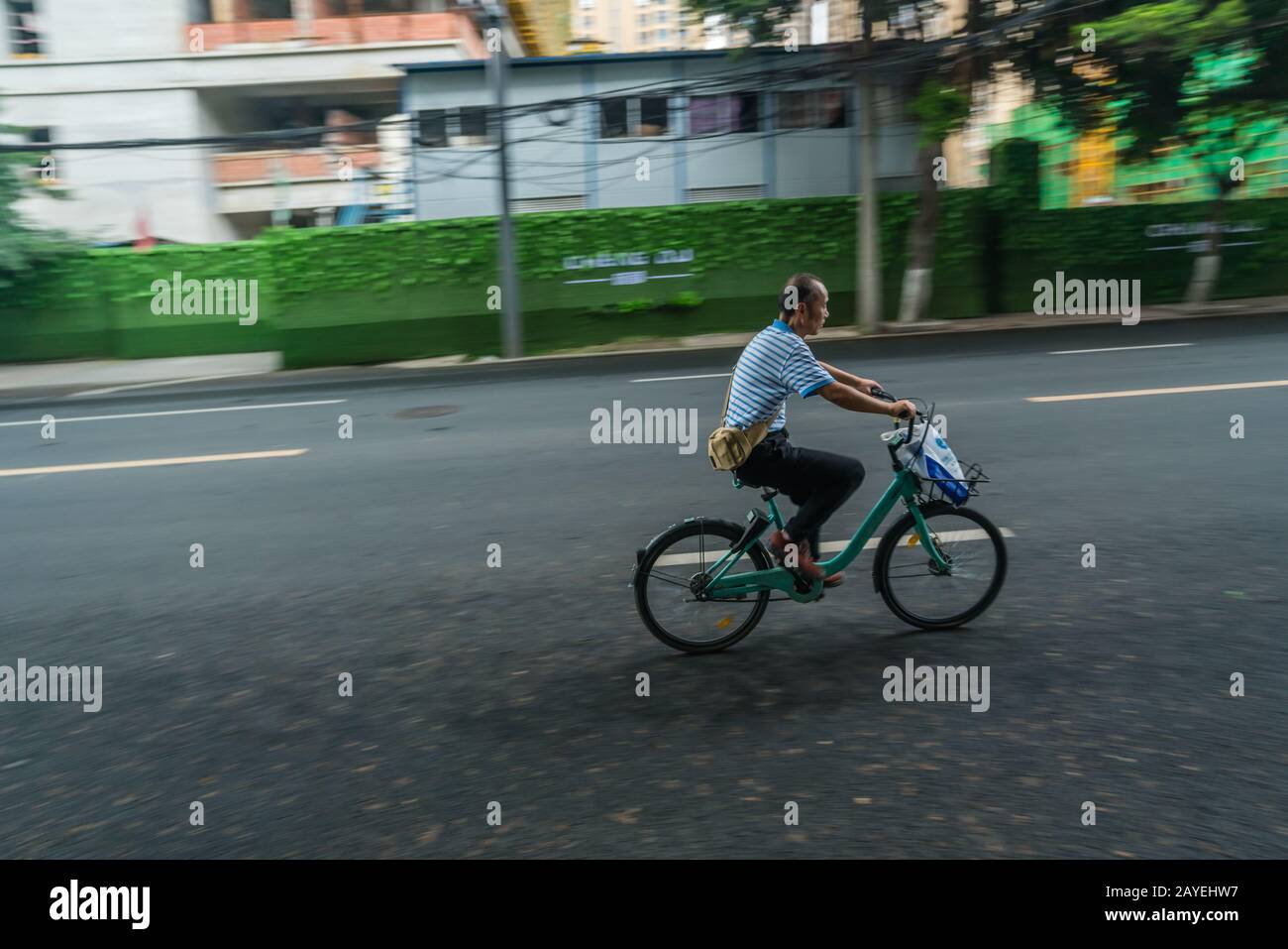 Chinese Man Riding Bike City High Resolution Stock Photography and ...