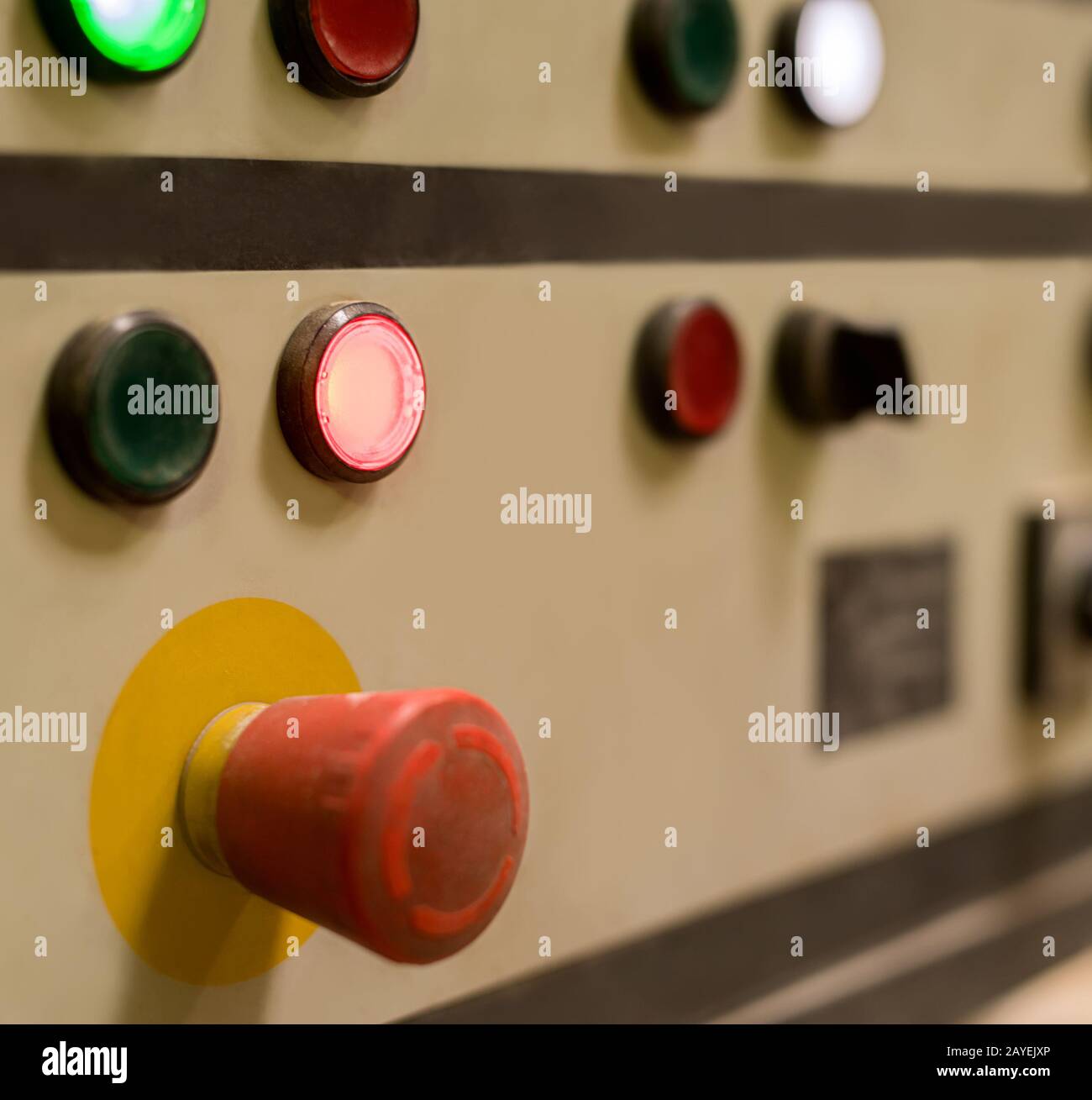 Close-up of red switch on remote control panel Stock Photo - Alamy