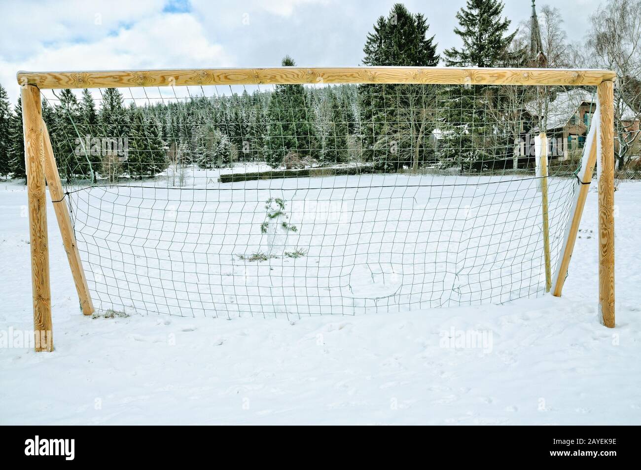 third man behind the goal-the snowman in winter Stock Photo - Alamy