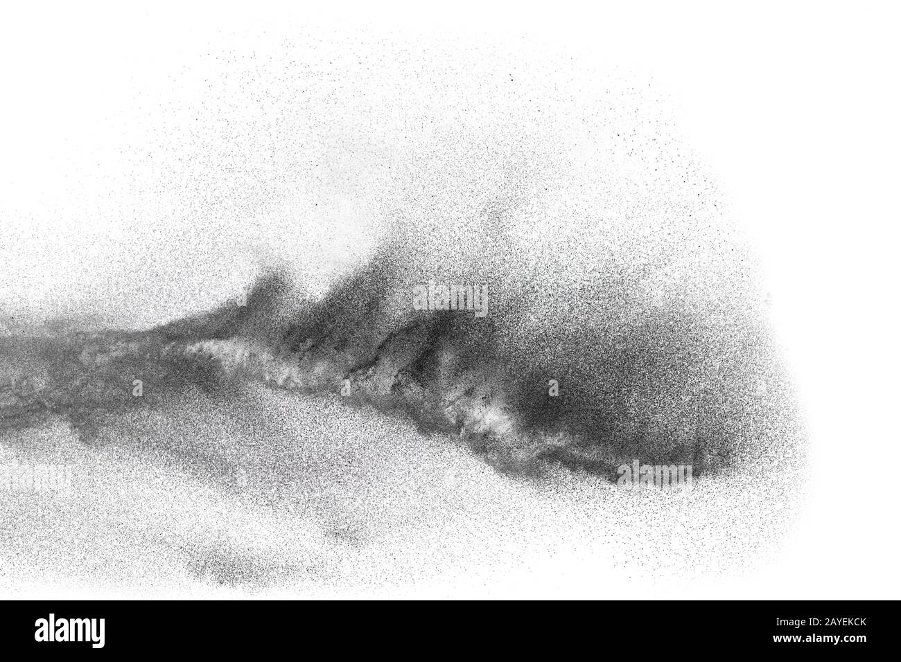 Black powder explosion against white background.Charcoal dust particles ...