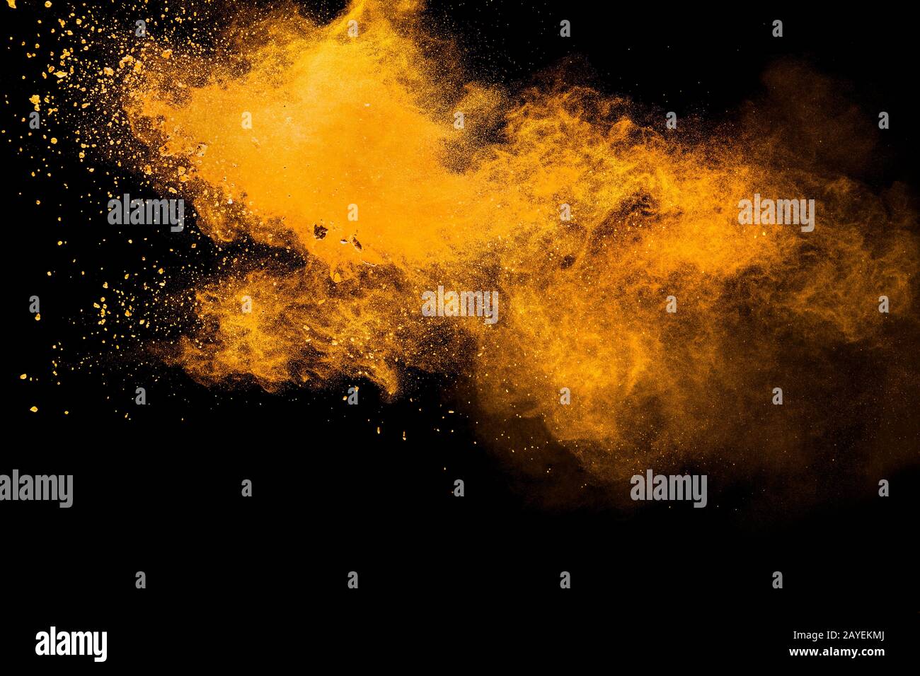 Brown powder explosion on black background Stock Photo - Alamy