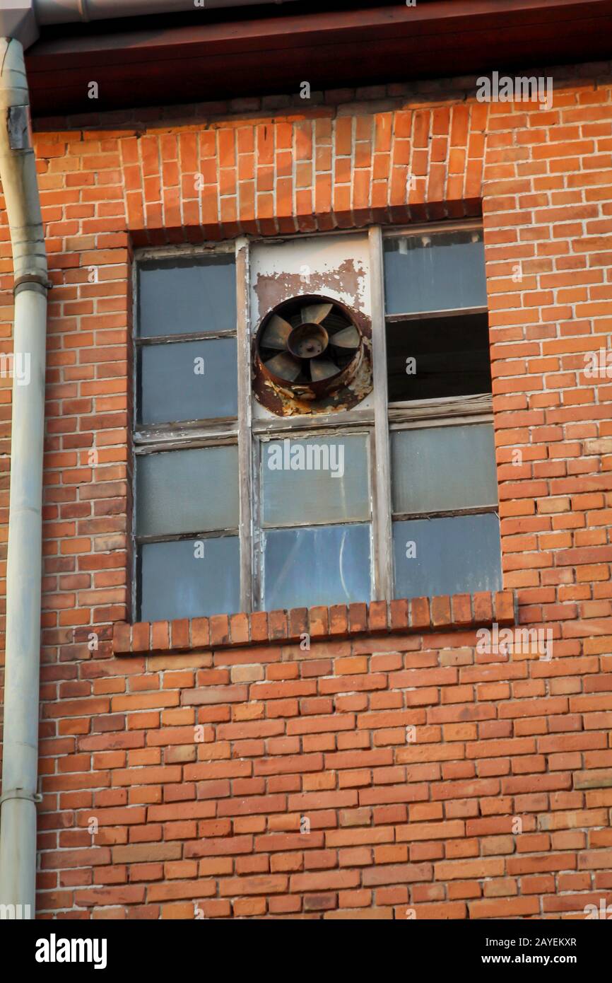 View of an old former factory with broken windows Stock Photo - Alamy