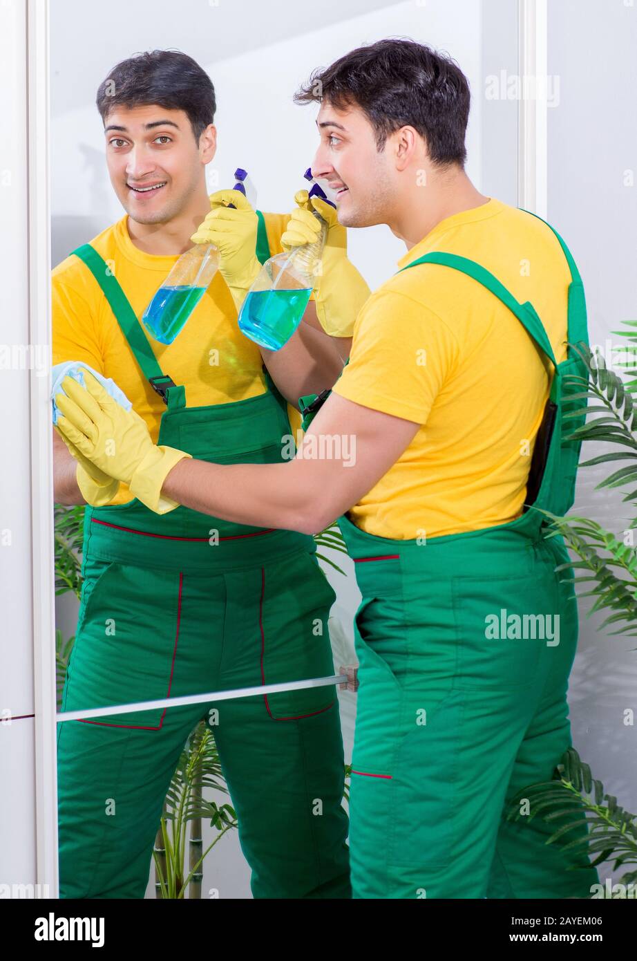Professional cleaning contractor working at home Stock Photo - Alamy