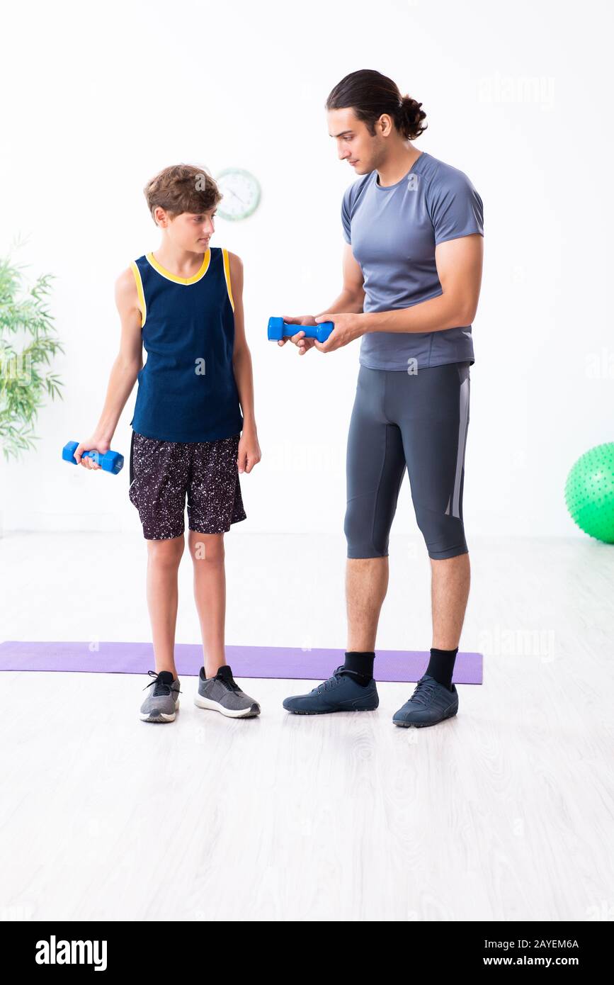 Father coaching son hi-res stock photography and images - Alamy