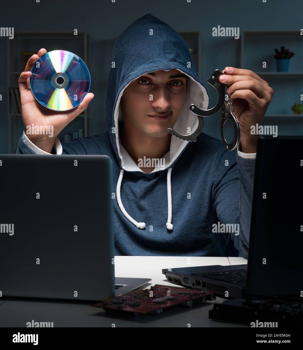 Hacker hacking computer at night Stock Photo - Alamy