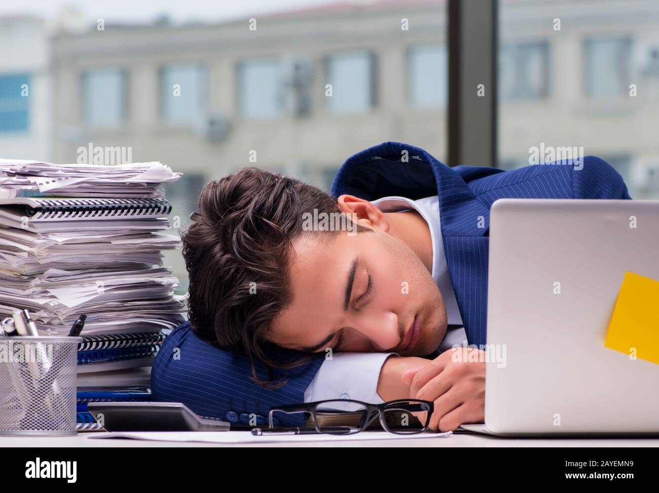 Workaholic businessman overworked with too much work in office Stock ...
