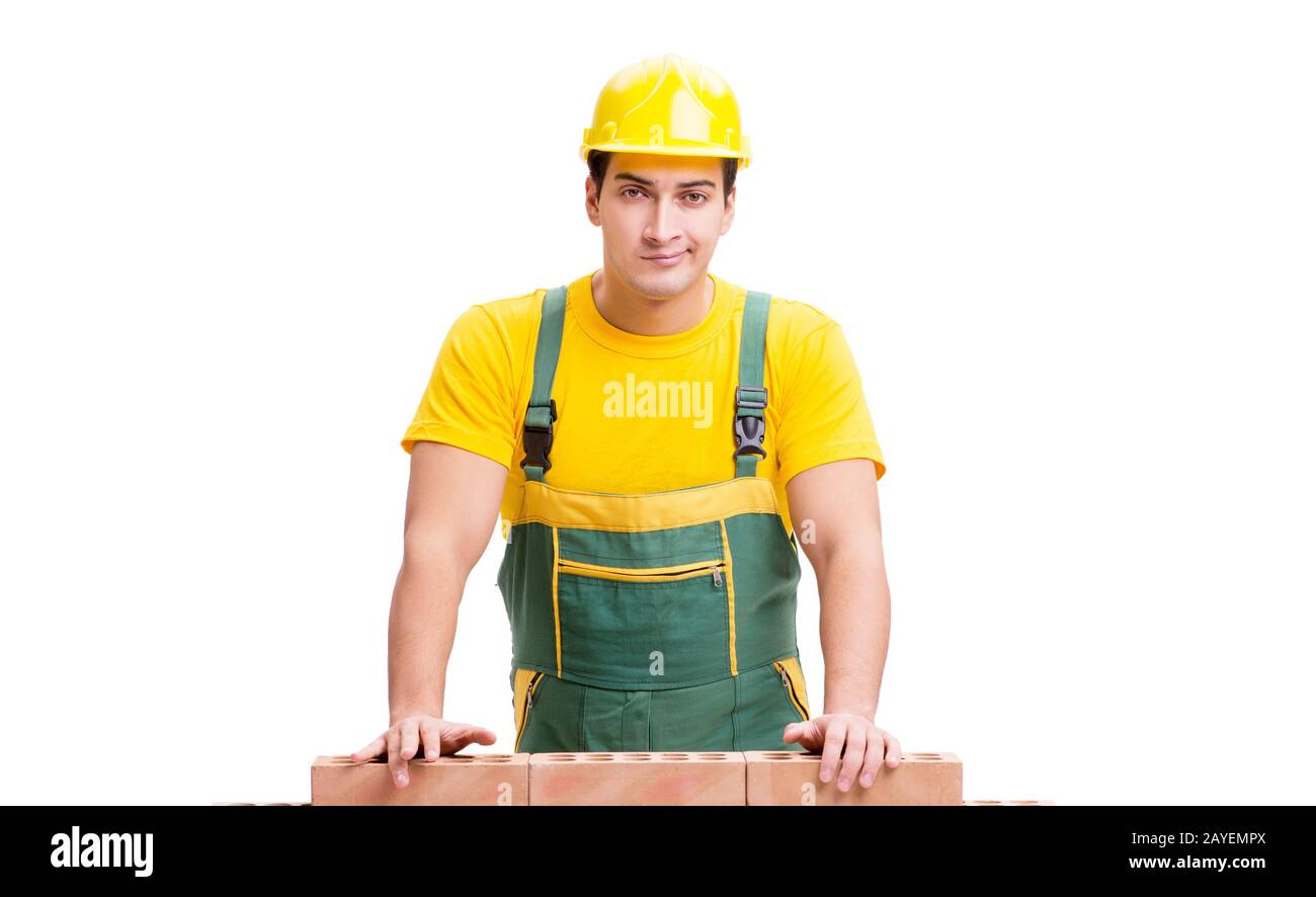 The handsome construction worker building brick wall Stock Photo - Alamy