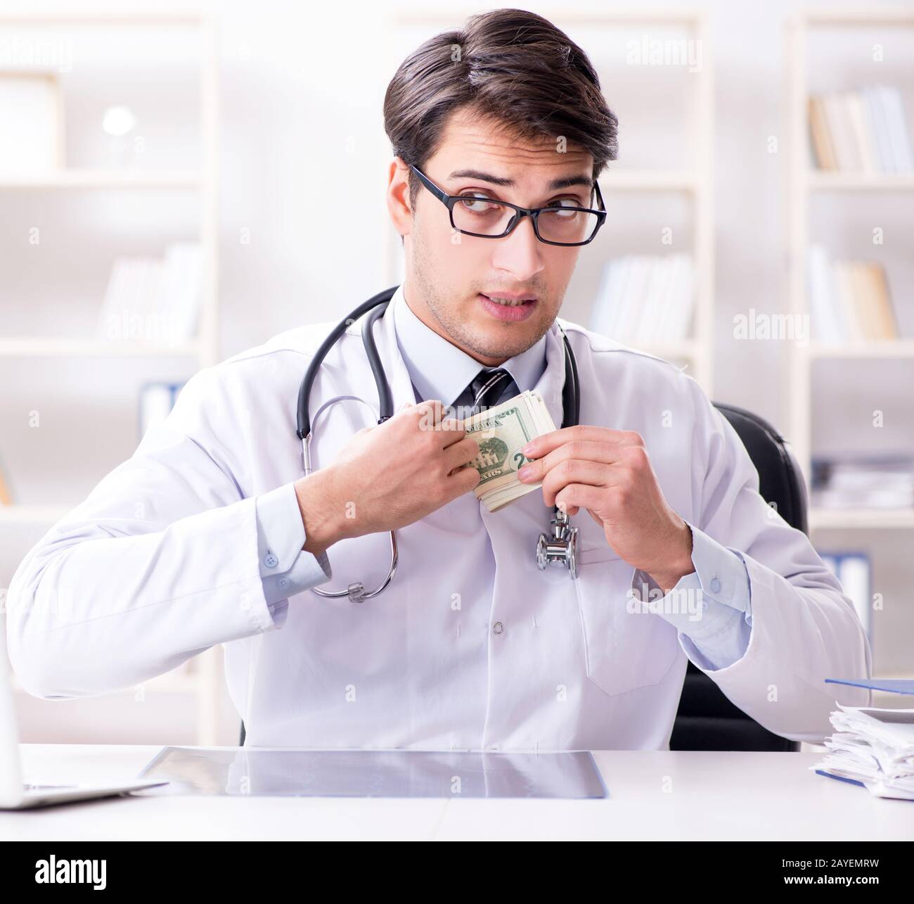 Doctor money envelope hi-res stock photography and images - Alamy