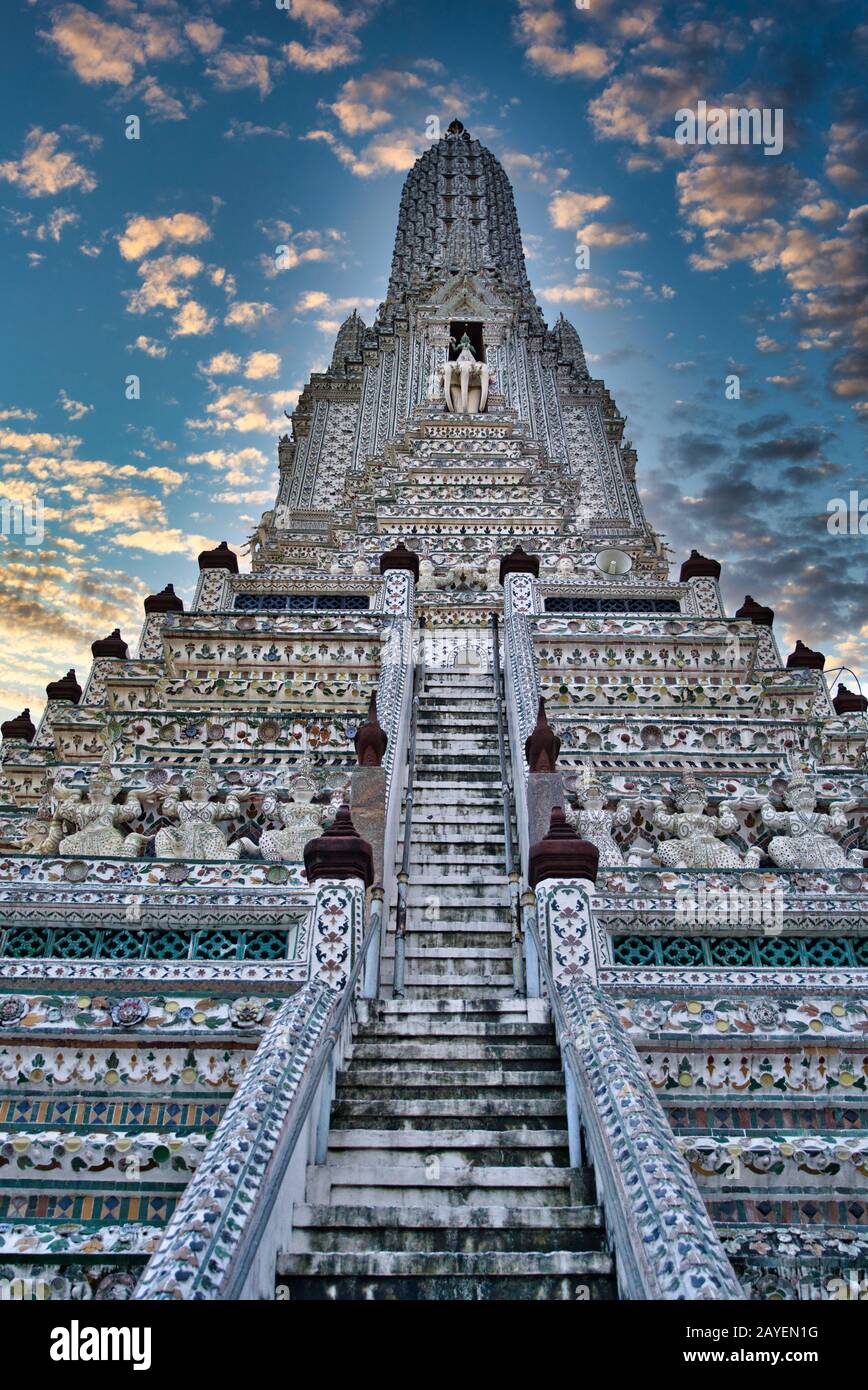 Vertical photo of The stairs and the pagoda of a Buddhist temple ...
