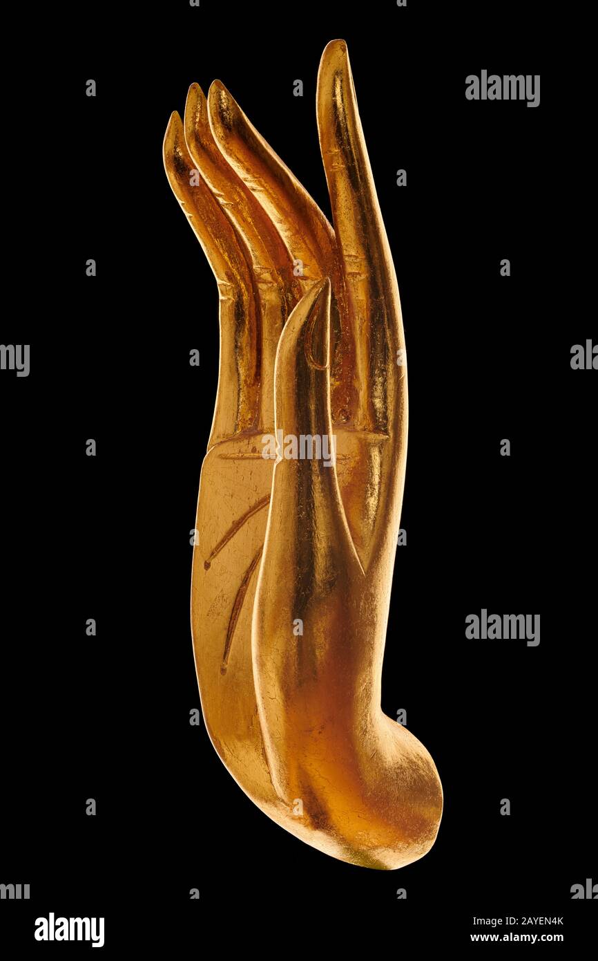 Golden hand of Buddha statue Stock Photo - Alamy