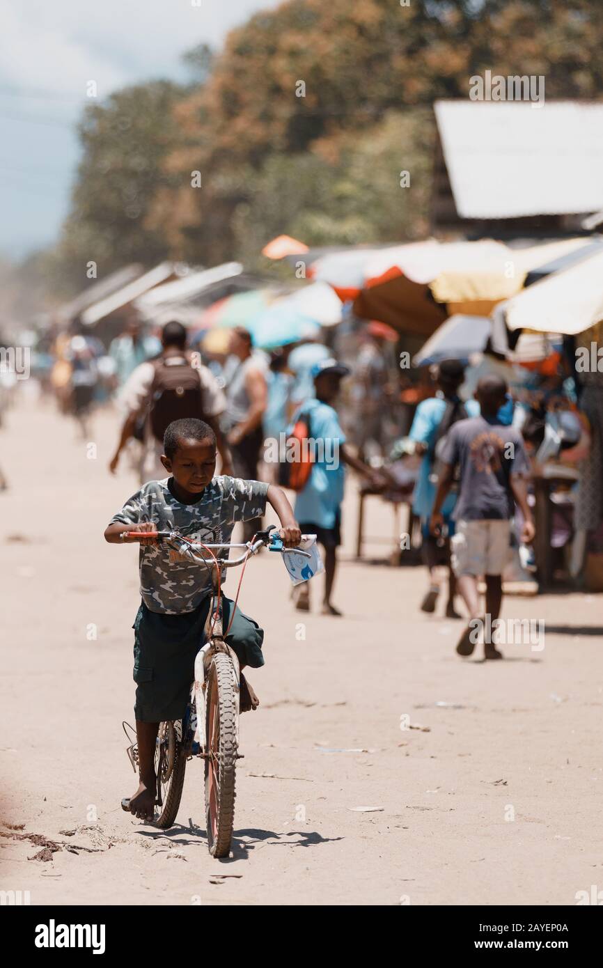African boy on bicycle hi-res stock photography and images - Alamy