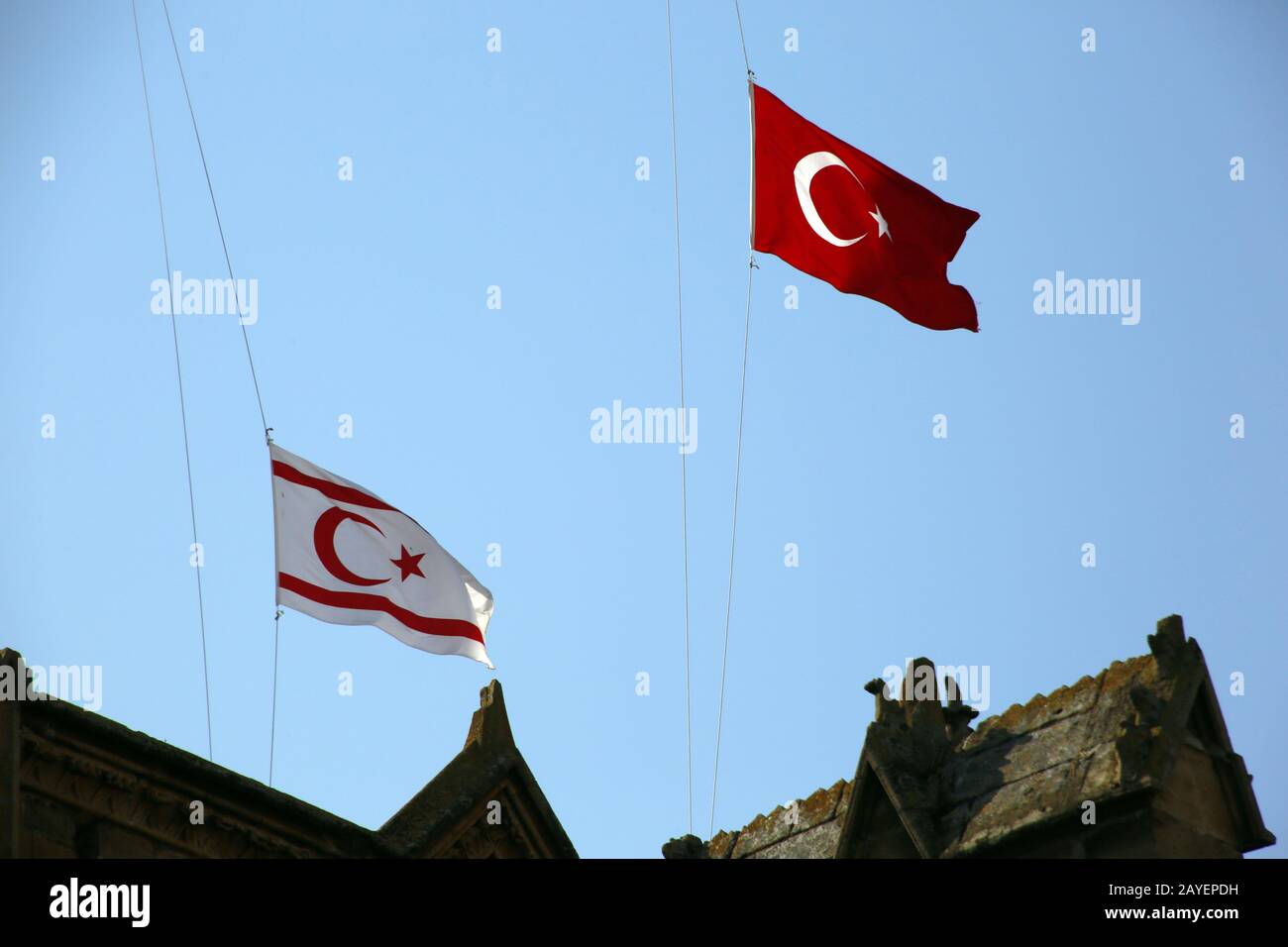 National Flags of Turkey and Northern Cyprus blow over the former Saint ...