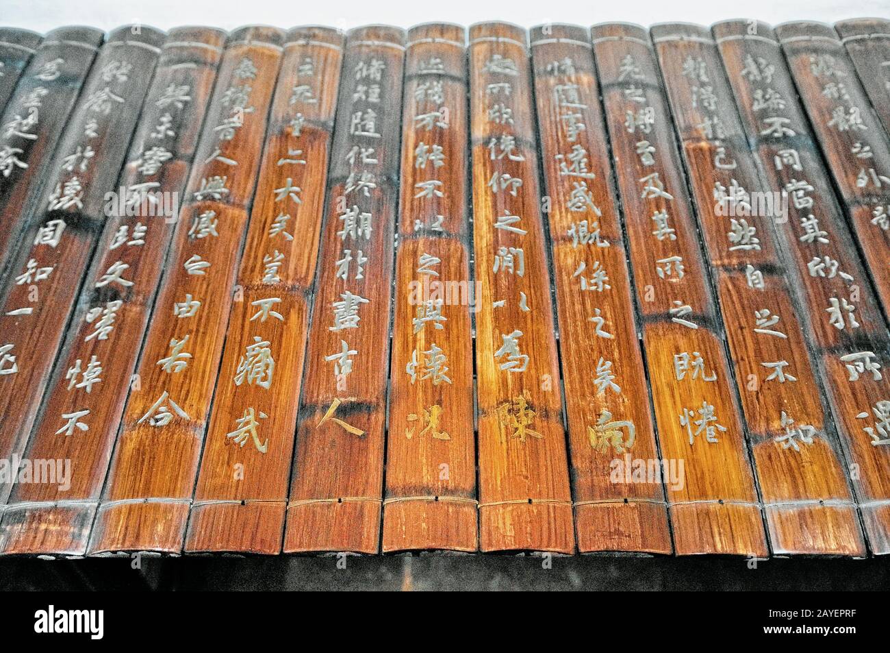 traditional scroll written on bamboo Stock Photo - Alamy