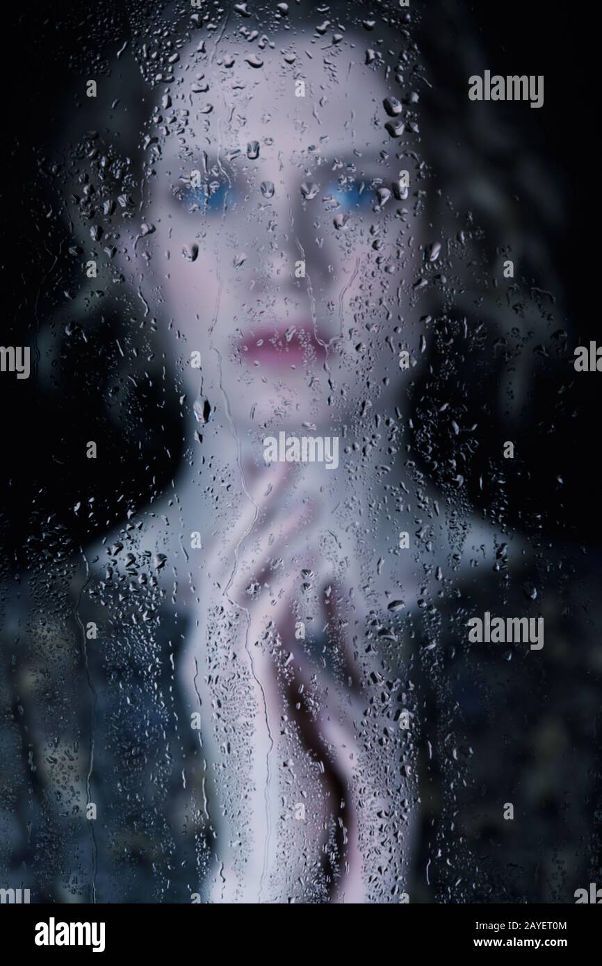 Old lady behind the window hi-res stock photography and images - Alamy