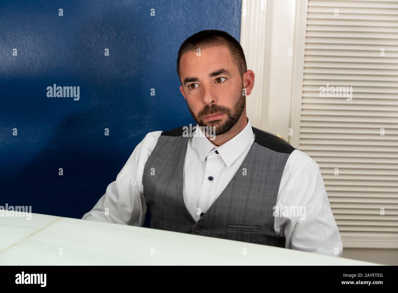 Stock photo of a young man with half beard and moustache with white ...