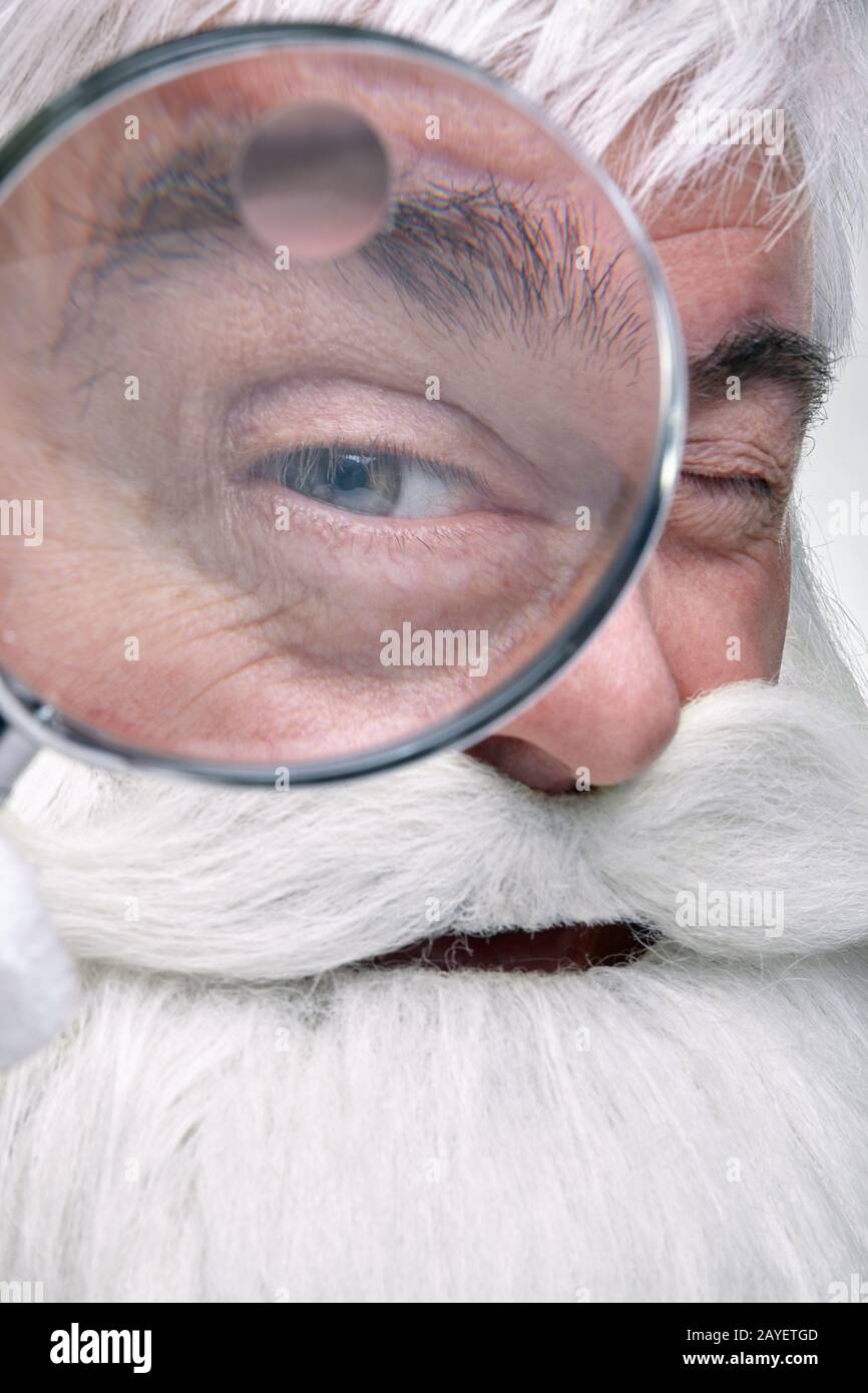 Santa claus with magnifying glass hi-res stock photography and images ...