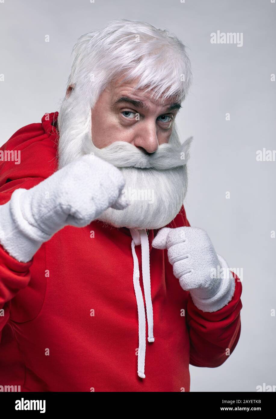 Portrait of a Santa Claus in sportsware boxing Stock Photo - Alamy