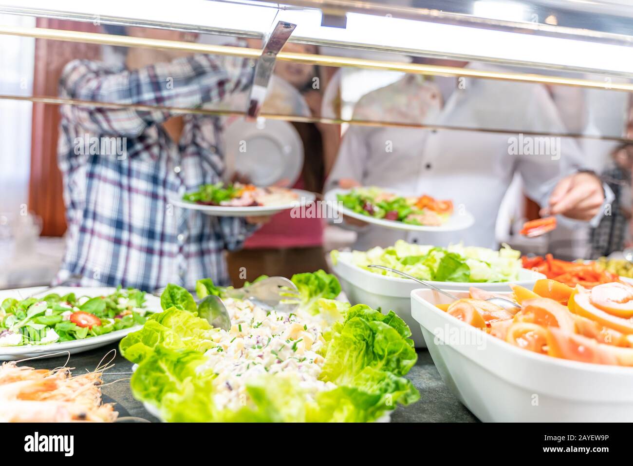 Stock photo of a counter with healthy food and people in the background ...