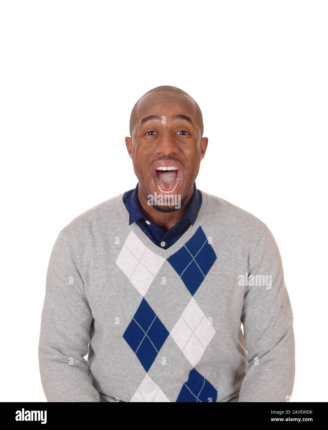 An African man standing and screaming Stock Photo - Alamy