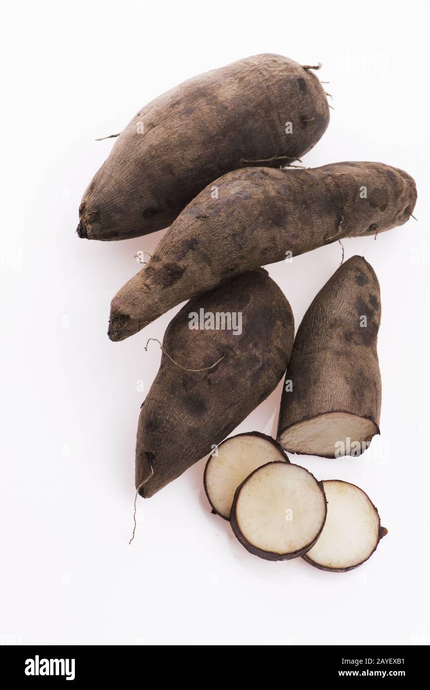 Fresh Yacon roots on white background Stock Photo - Alamy