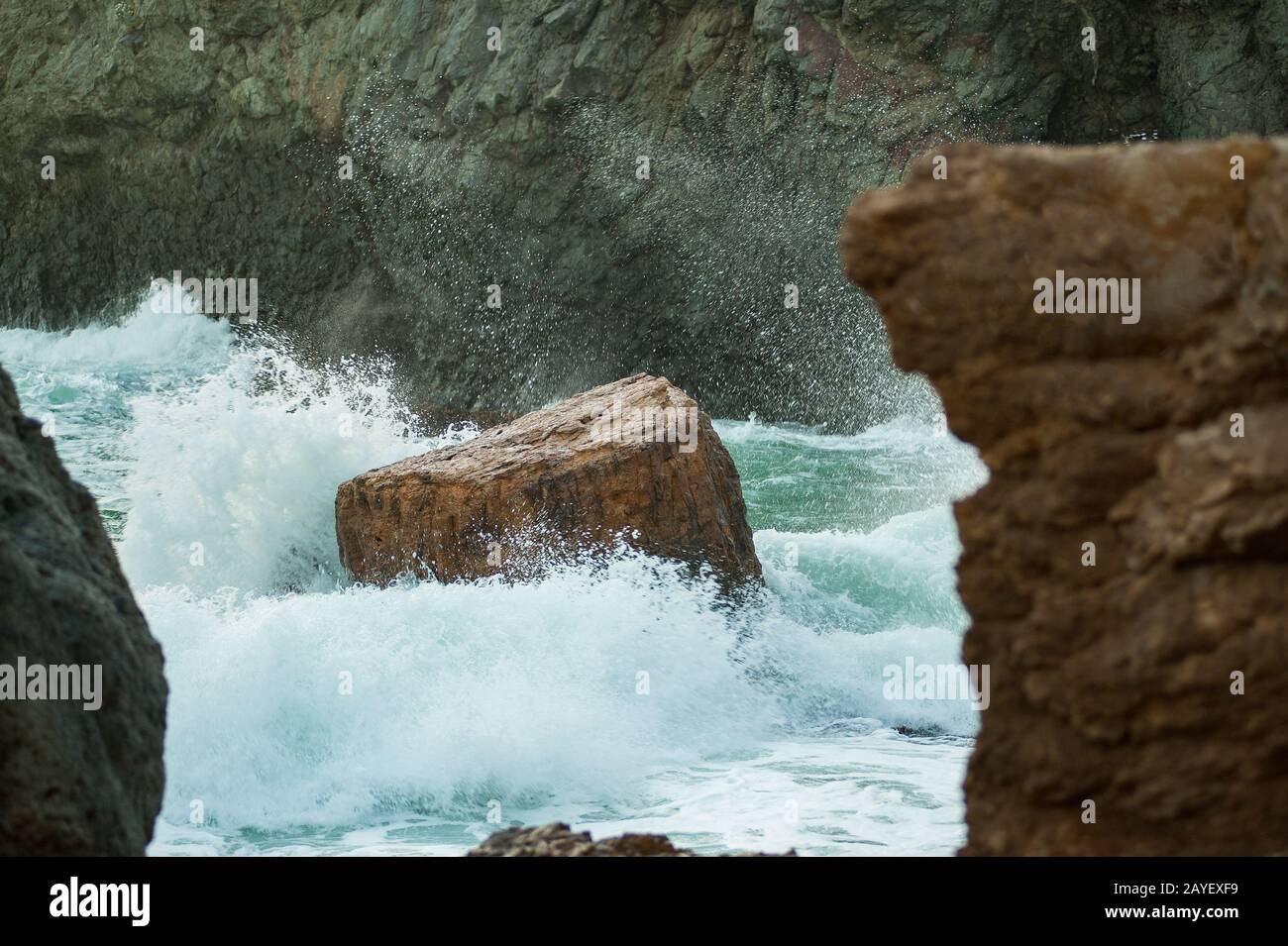 Waves are breaking on stones. Storm at sea Stock Photo - Alamy