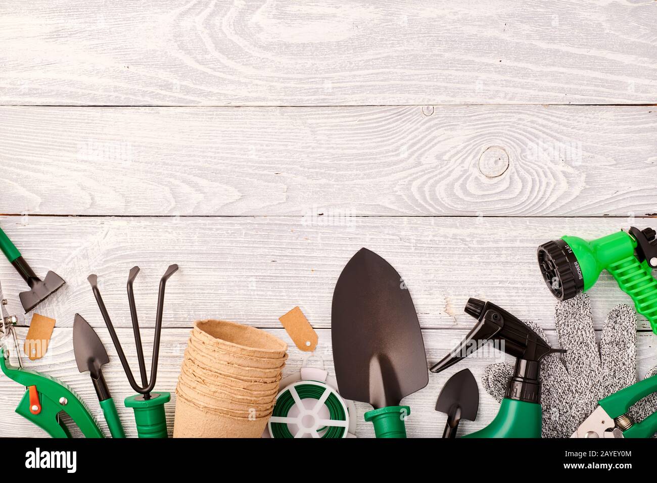 Gardening tools on wooden background flat lay Stock Photo - Alamy