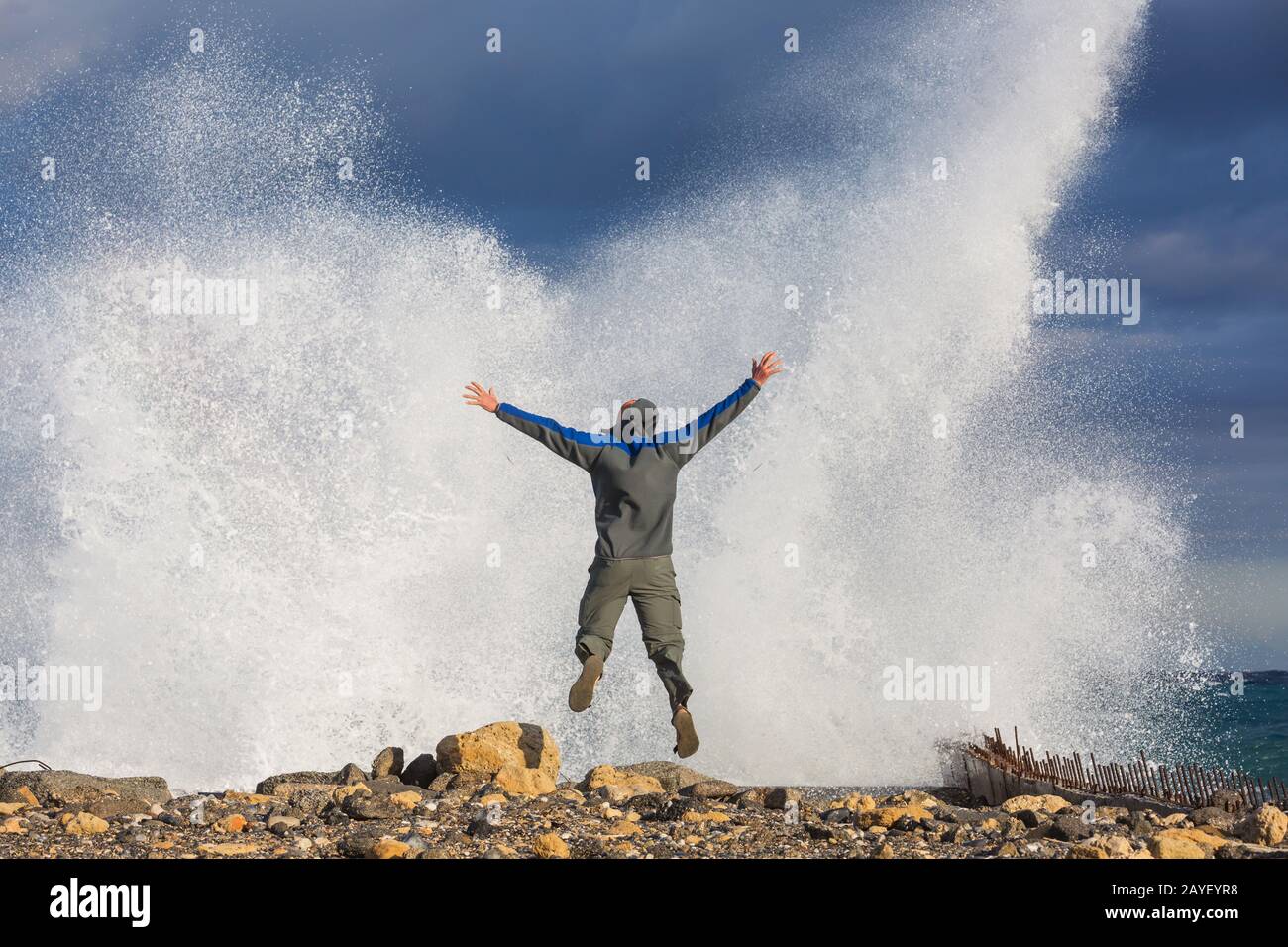 Jumping on the beach Stock Photo - Alamy