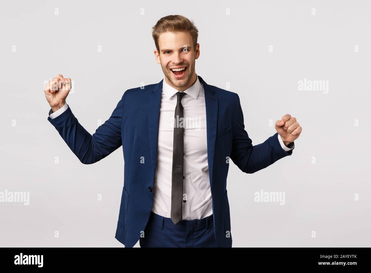 Relish, good deal and business concept. Handsome young blond bearded ...