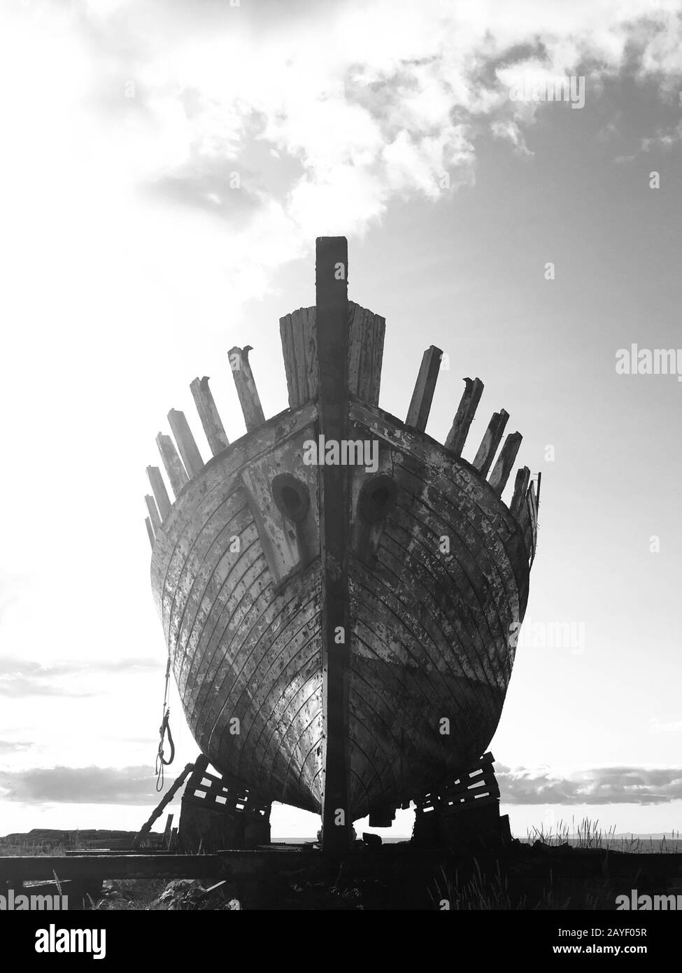 Rusty wooden and metal shipwreck in the Icelandic dry dock in Akranes ...