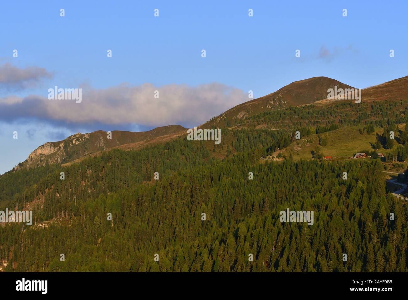 Gailtal Alps with goldeck and staff Stock Photo - Alamy