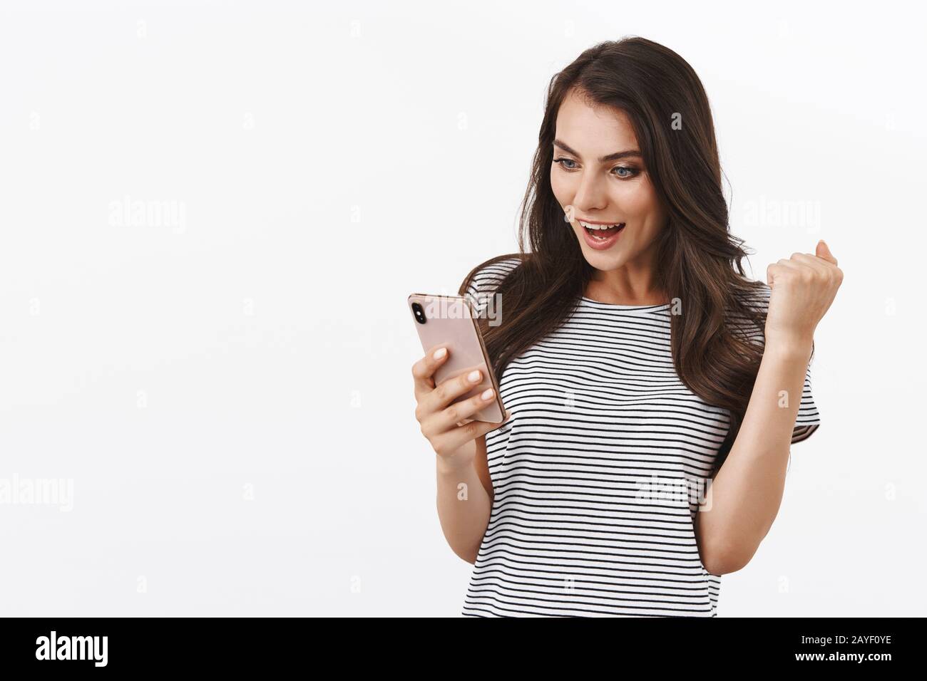 Girl receive wonderful news via message. Successful, pleased and happy ...