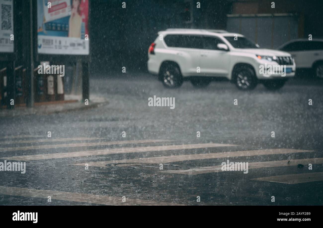 Tropical monsoon rain in Chengdu Stock Photo - Alamy