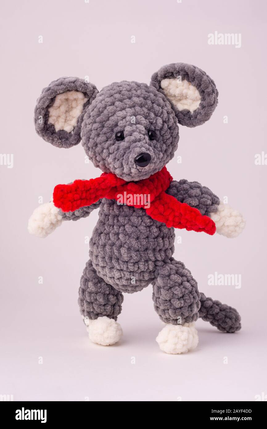 Funny knitted teddy mouse, white background Stock Photo - Alamy