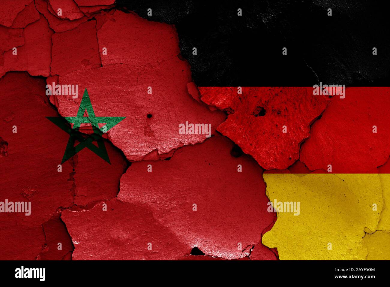 flags of Morocco and Germany painted on cracked wall Stock Photo - Alamy