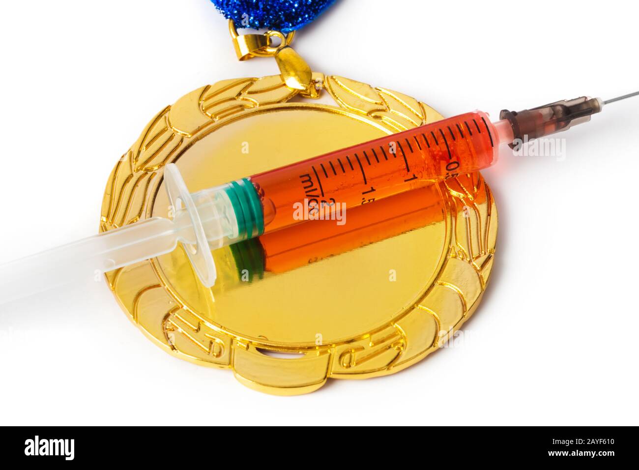 Gold medal and syringe Stock Photo - Alamy