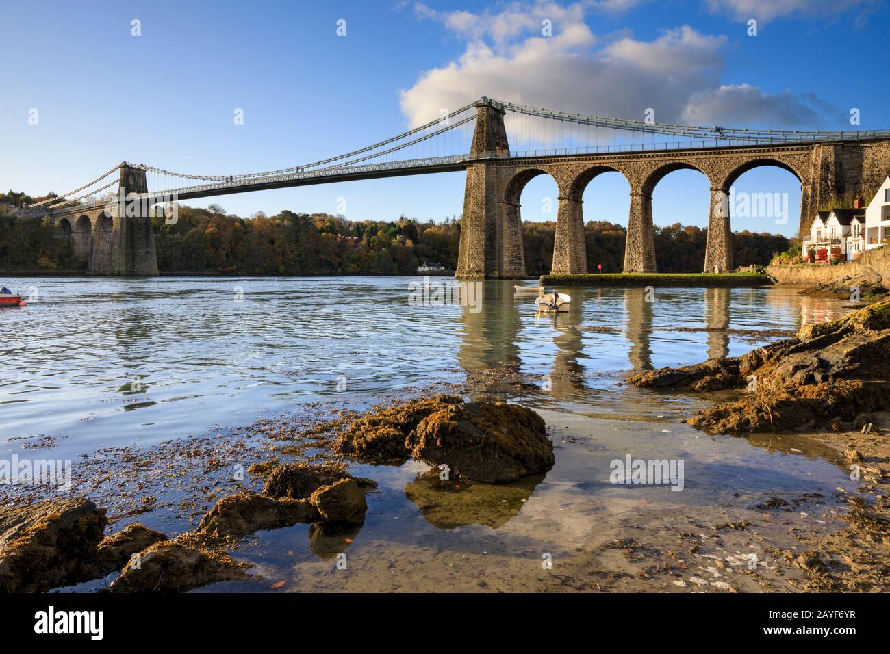 The Thomas Telford Suspension Bridge captured from Anglesey Stock Photo ...