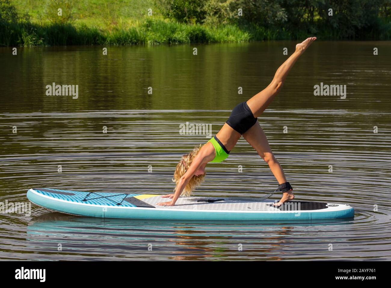 Young woman exercises on yoga hi-res stock photography and images - Alamy