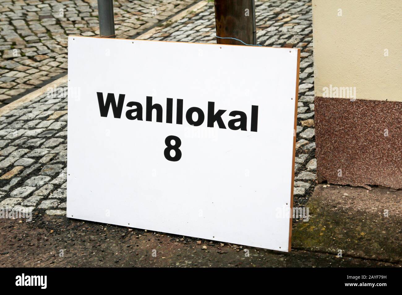 a sign indicates the polling station on election day Stock Photo - Alamy