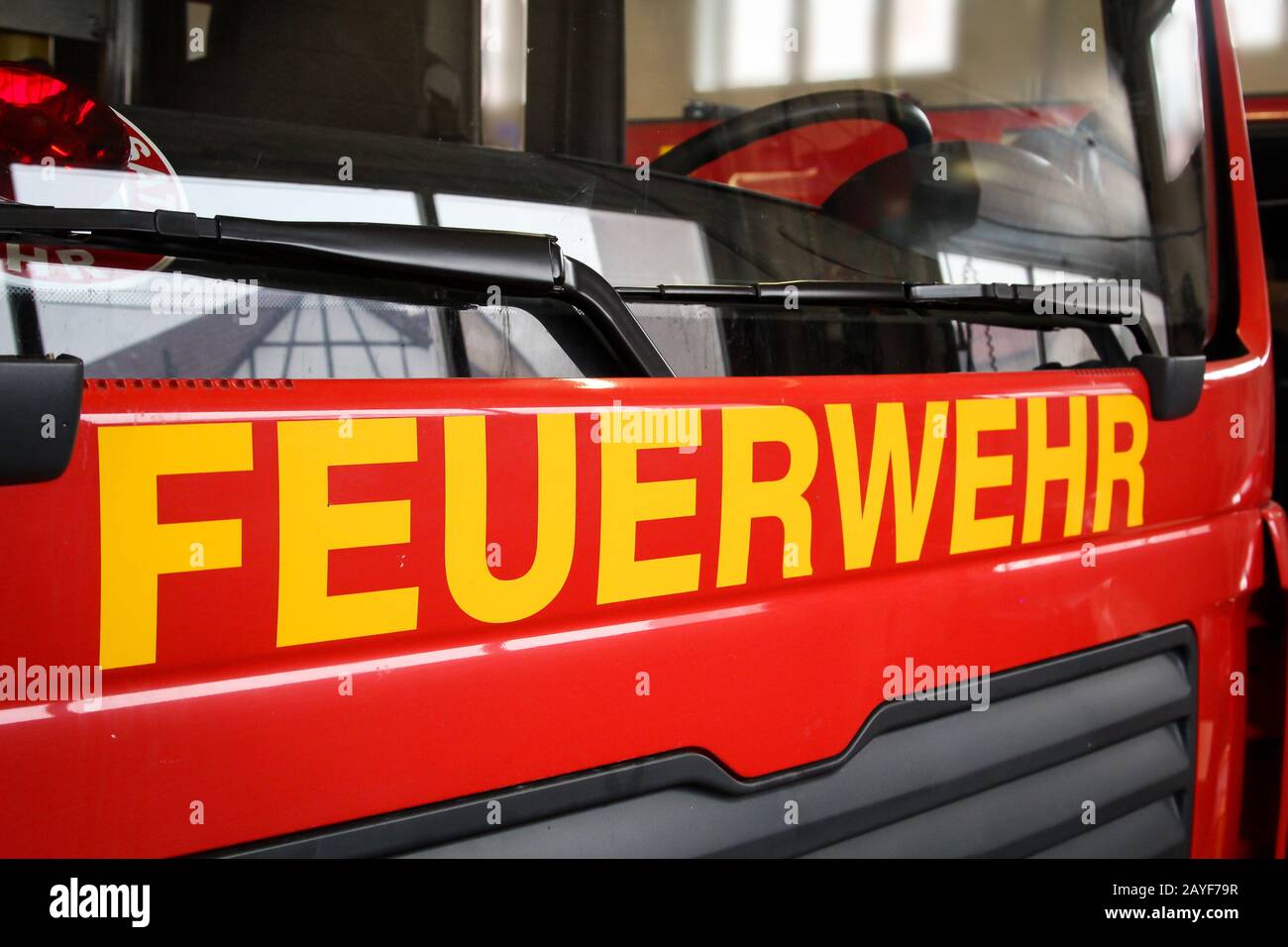 Front view of a fire engine car with the lettering fire department ...