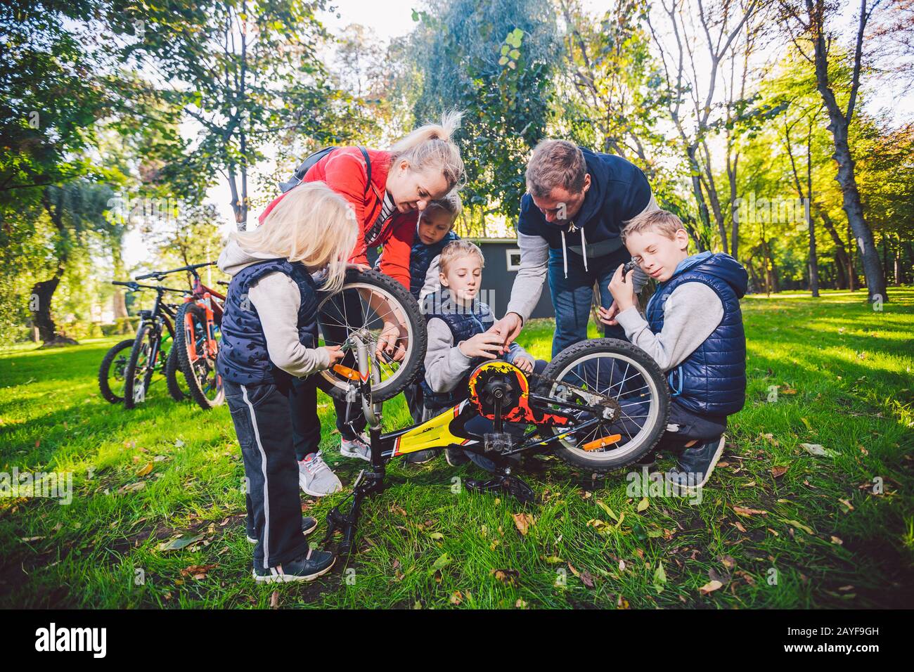 The theme of teamwork and friendly family. Outdoor activities. Parents ...