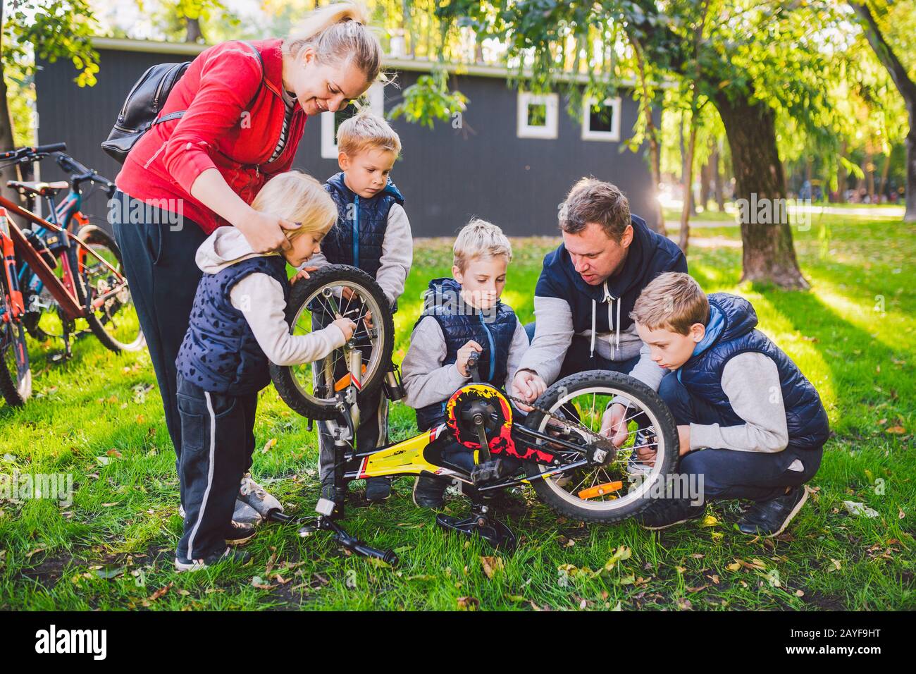 The theme of teamwork and friendly family. Outdoor activities. Parents ...