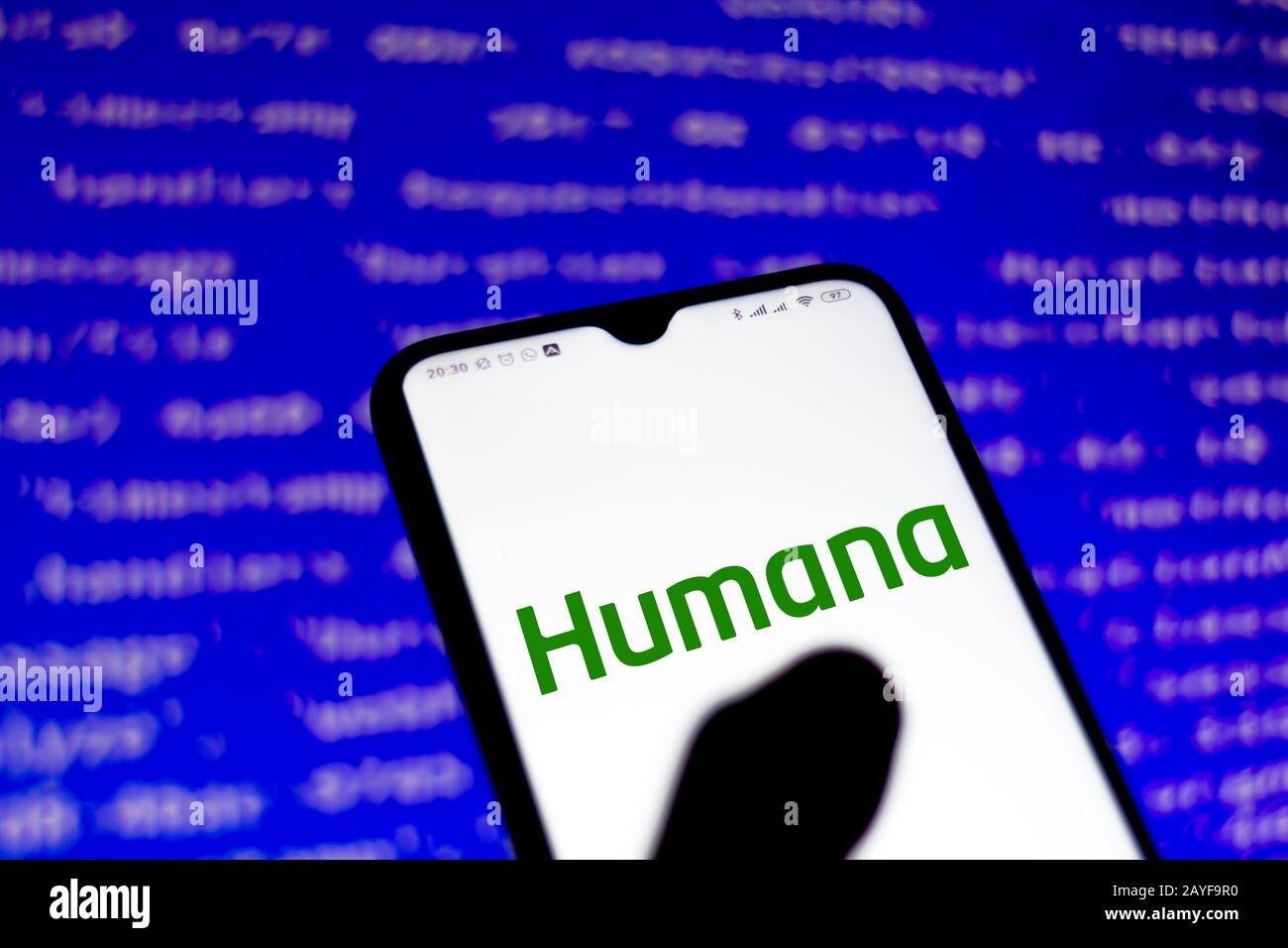 In this photo illustration a Humana Inc logo app seen displayed on a ...