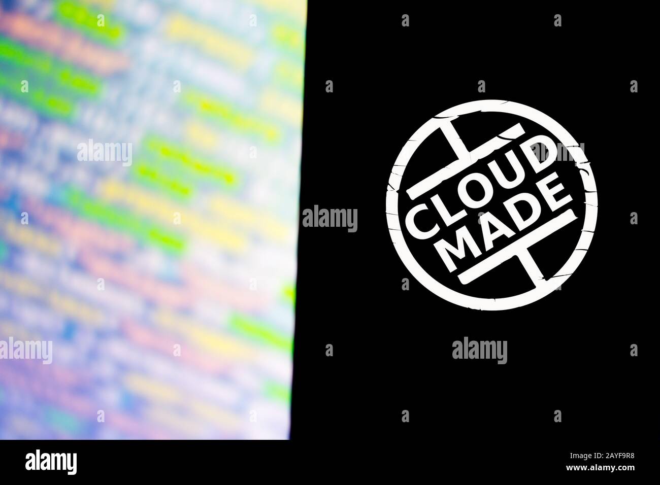 In this photo illustration a CloudMade logo app seen displayed on a smartphone Stock Photo - Alamy