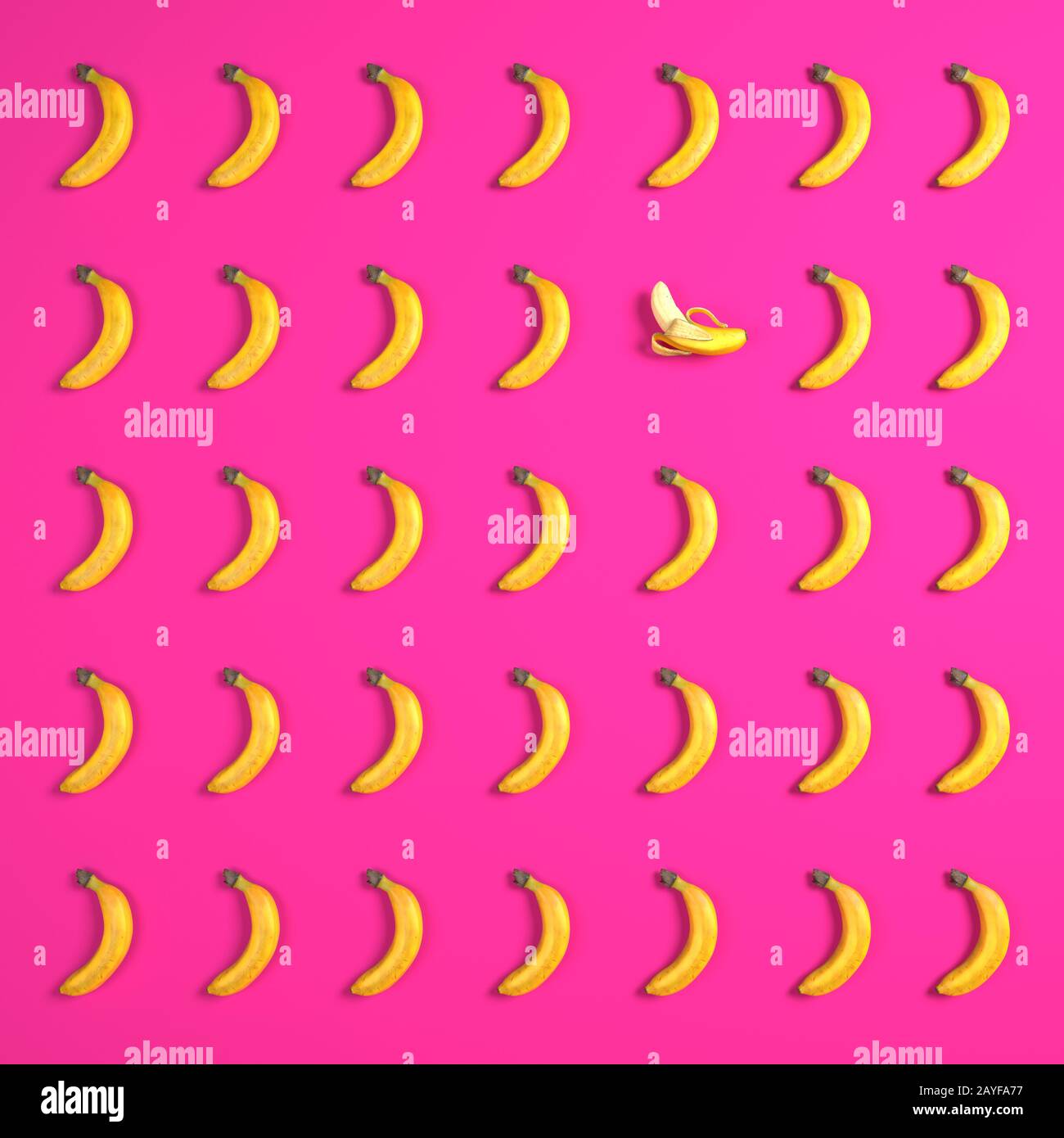 Pattern of bananas in an array of columns and rows on a brigth pink ...