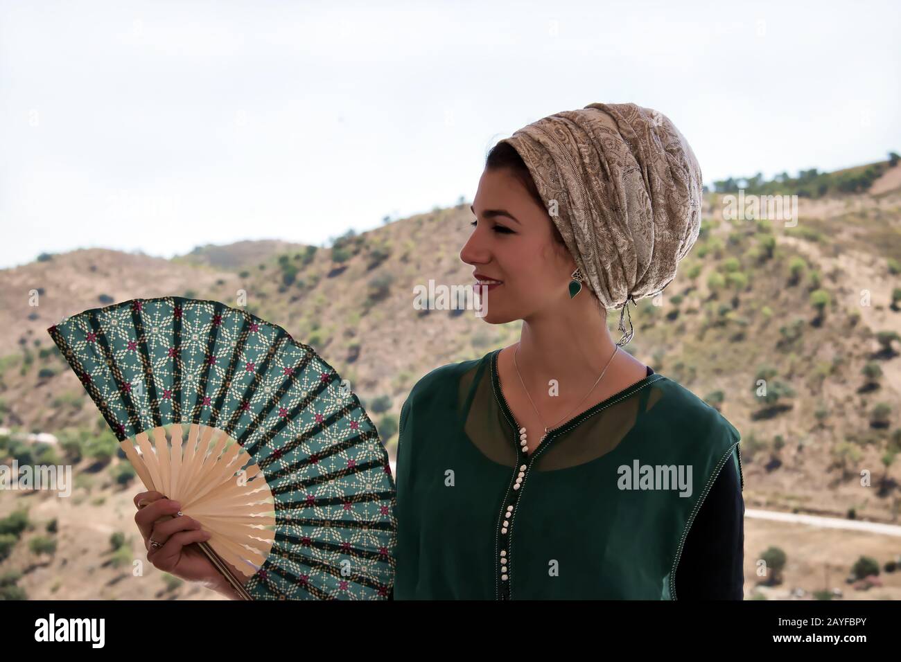 Woman fanning herself hi-res stock photography and images - Alamy