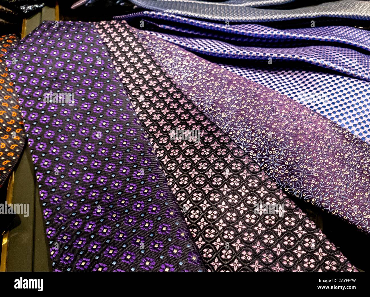 Men's tie layout on table with multiple colors and patterns Stock Photo ...
